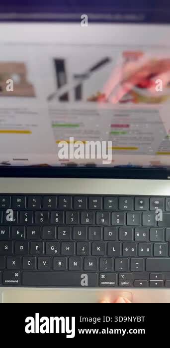 A top view video of a laptop screen showing a user scrolling through an ...