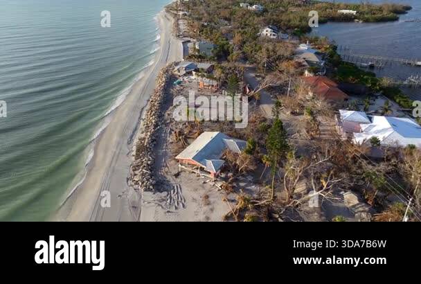 Destroyed houses on ocean coast. Hurricane Milton consequences in ...