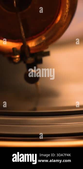 Retro vinyl gramophone from the 1920s with a brass horn and manual ...