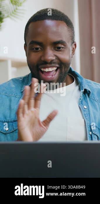 Portrait of likable satisfied smiling friendly bearded 25-aged african ...
