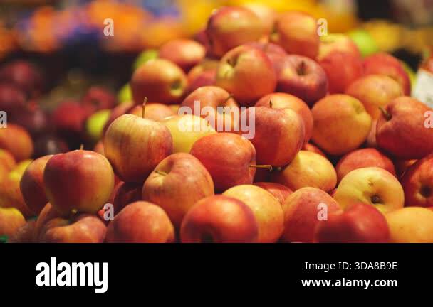 A pile of apples and other fruits in boxes at the supermarket Stock ...