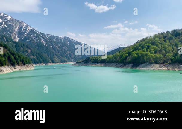 Kurobe Dam and Lake Kurobe beside the Tateyama Kurobe Alpine Trail. The ...