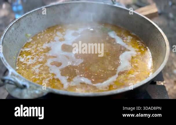 Woman cooking over open fire Stock Videos & Footage - HD and 4K Video ...