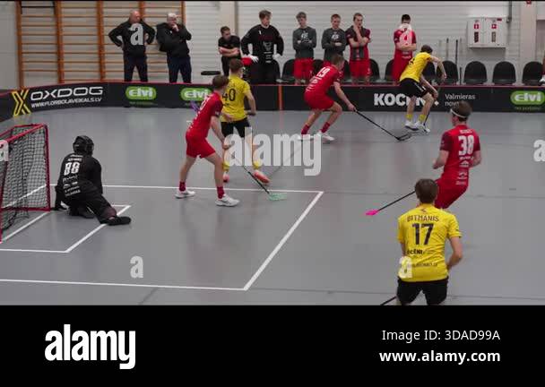 Valmiera, Latvia - December 03, 2025: Dynamic floorball match unfolds ...
