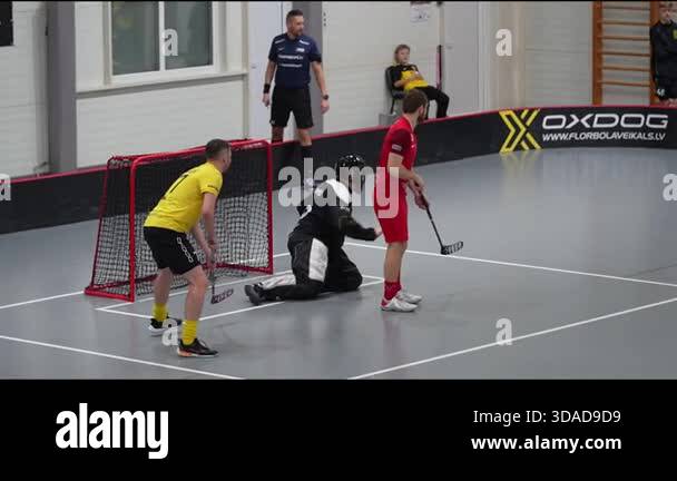 Valmiera, Latvia - December 03, 2025: Dynamic floorball scene with ...
