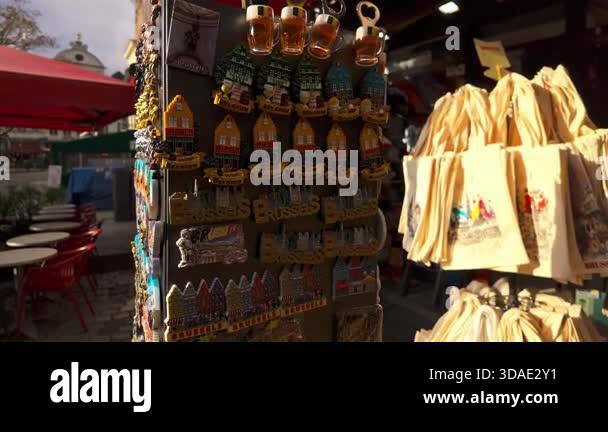 BRUSSELS, BELGIUM - NOVEMBER 26, 2025 - Souvenir shop stall selling ...