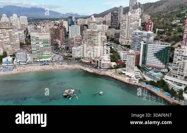 Aerial drone view of Benidorm beachfront with tall residential ...