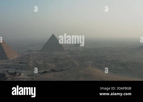 Drone captured aerial view of the Giza pyramids, showcasing the ...