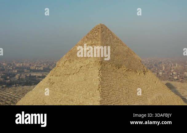 Drones fly in circular patterns around the top of the Khafre Pyramid at ...