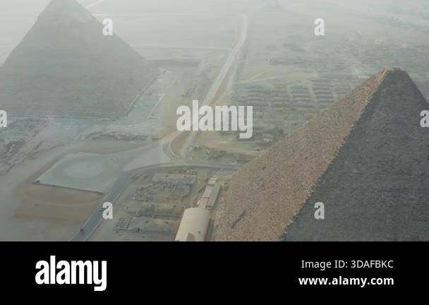 Aerial view of the Giza pyramids captured by drone, showcasing the ...