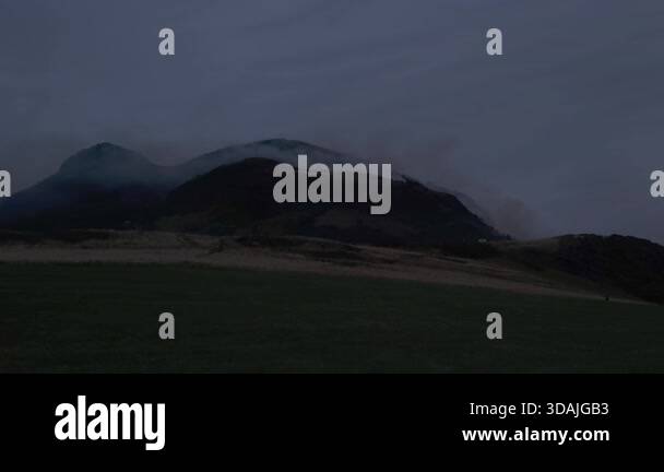 EDINBURGH, SCOTLAND, UK - AUGUST 10, 2025: Fire is seen on Arthurs Seat ...