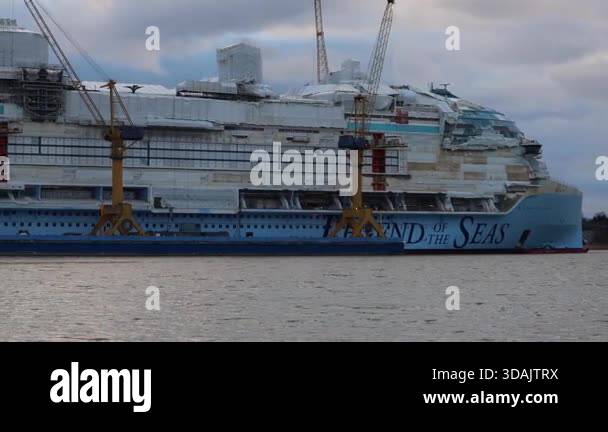 4K video showing the construction of a large ship at sea, filmed from a ...