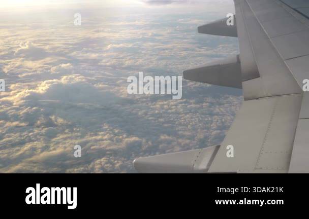 A large airplane flying high up in the air. High quality footage Stock ...