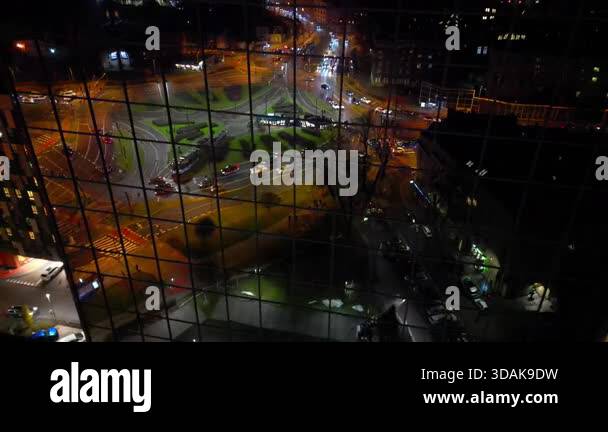 Modern office building with reflective glass facade showcasing evening ...