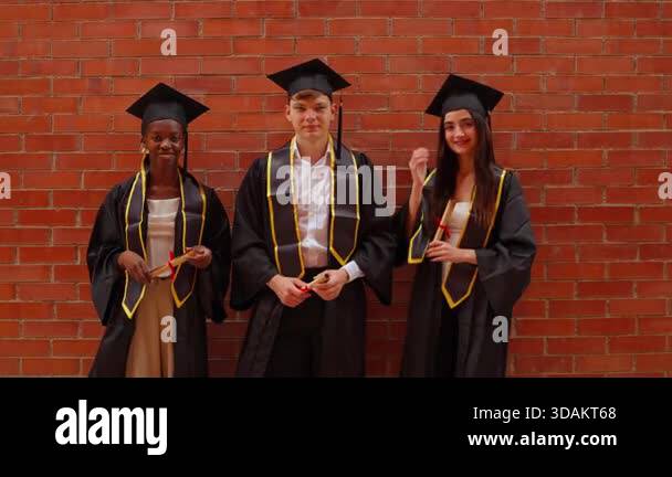 Happy graduates celebrating academic Stock Videos & Footage - HD and 4K ...