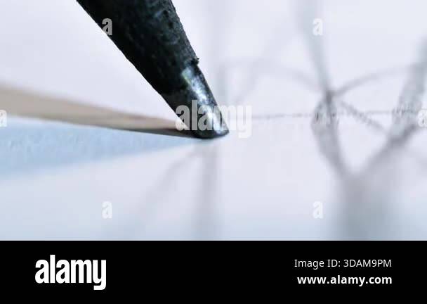 An extreme macro shot showing a pencil tip in motion, emphasizing the ...
