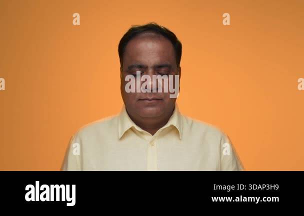Portrait of Adult Indian Man Looking at Camera in Color Studio Shot ...