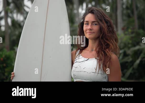 Woman Surfer With Surf Board At Green Nature Of Sea Beach. Happy Female ...
