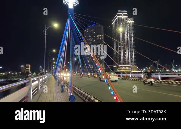 Aerial night view over Da Nang Vietnam showing shimmering river ...