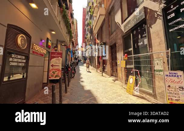 Busy street scene with shops and pedestrians Stock Video Footage - Alamy