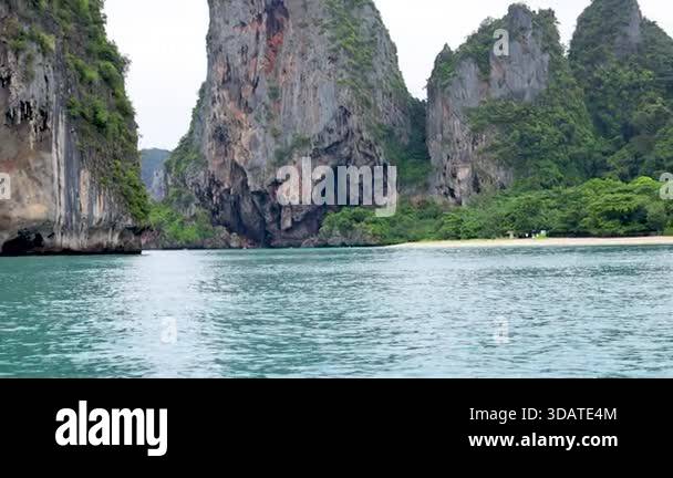 Lush cliffs and serene waters in Krabi Stock Video Footage - Alamy
