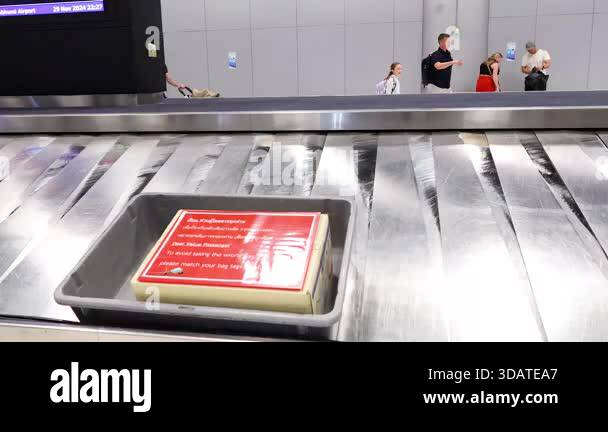Baggage moving on carousel at airport terminal Stock Video Footage - Alamy