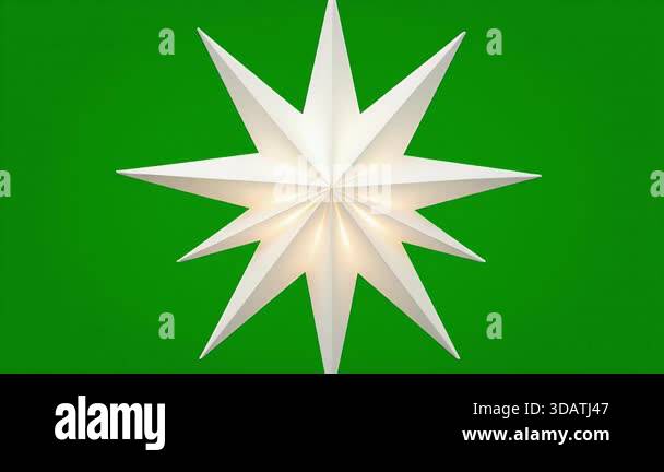 Slow rotating white paper star lantern on solid green background ...