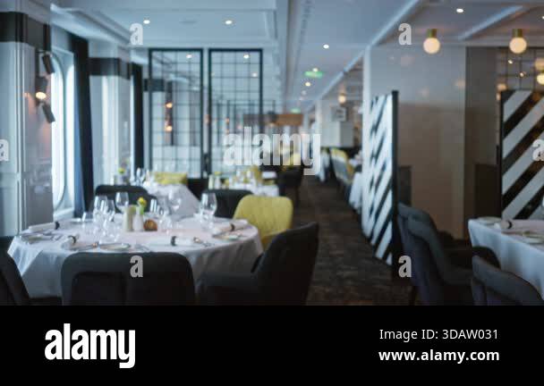 Blurred bokeh view of a luxury restaurant interior with softly ...