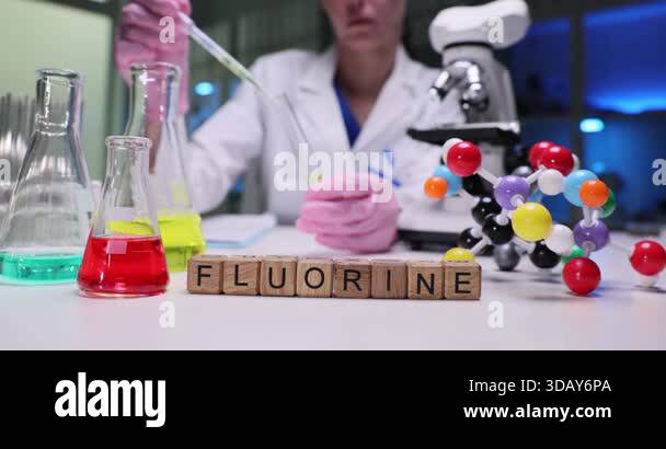 Word Fluorine on wood blocks by color fluids and molecular structure ...