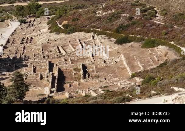 An aerial shot shows the ancient ruins of Kamiros an old Dorian city on ...