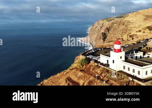 This shows an aerial view of Ponta do Pargo lighthouse and the rugged ...