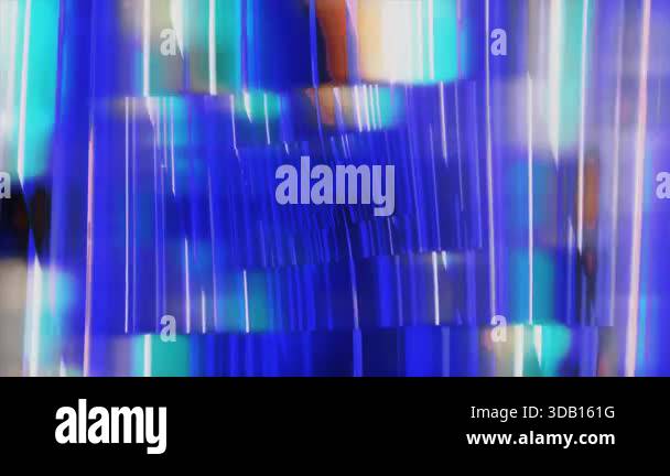 Abstract shapes morph and blend creating vibrant, moving colors in a ...