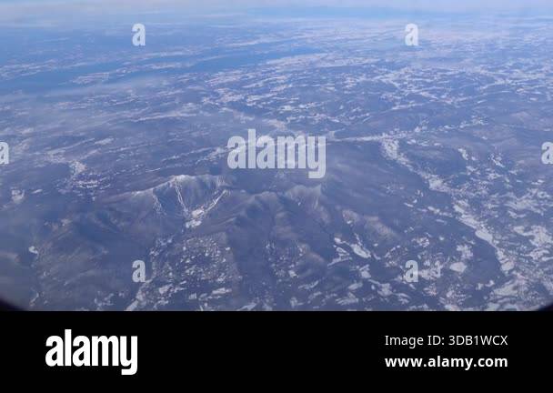 In flight, Canada An in-flight snowy landscape view of the Northern ...