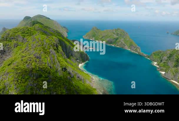 Islands with white Beaches. Tapiutan Island. Matinloc Island with blue ...