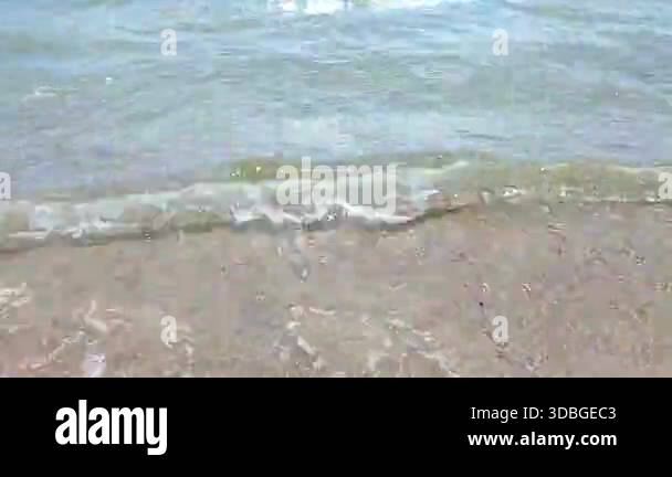 Beautiful sea waves with turquoise transparent water rolling onto sand ...