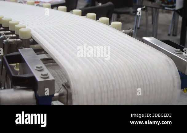 Modular belt rotary conveyor continuous Stock Videos & Footage - HD and ...