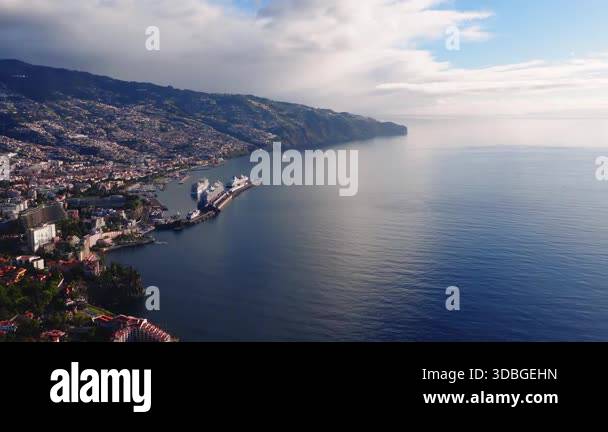Aerial view of Funchal, Madeira, Portugal. Cruise liners dock, slow ...