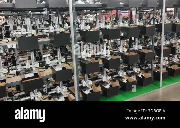Kyiv, Ukraine, May 25, 2025: Many 3D printers printing an object. 3D ...