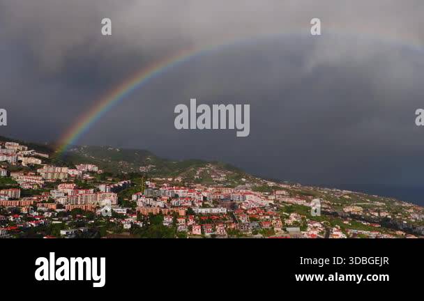 Aerial view of Funchal, Madeira, Portugal shows terraced red roofs ...