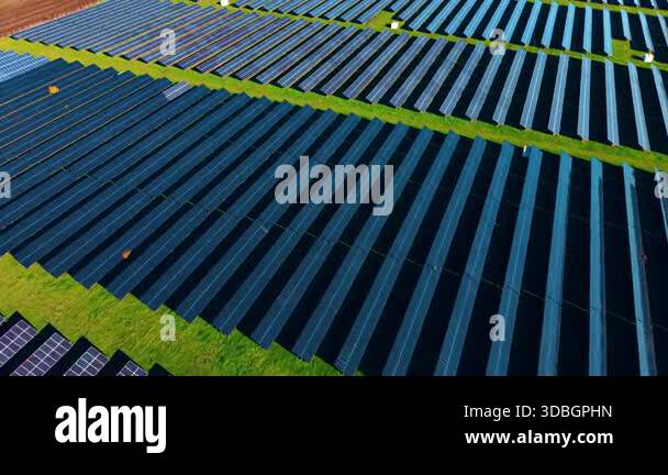 Footage over solar panel site turned to the sun. Photovoltaic cells ...