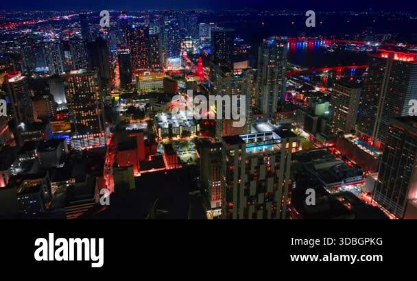 Eye-catching scenery of dazzling city at night. Drone flight above ...