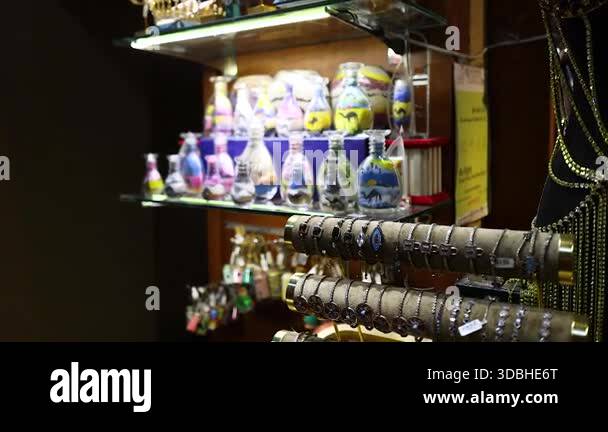 Colorful sand art bottles and jewelry display Stock Video Footage - Alamy