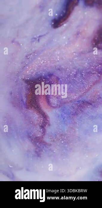 Vertical video. Shimmering emulsion. Defocused ink spread. Purple white ...