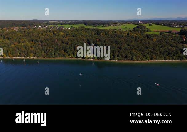 Scenic autumn landscape with Votive Chapel Berg at Starnberg Lake ...