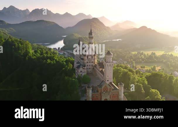 Romanesque revival neuschwanstein castle perched dramatically on rocky ...
