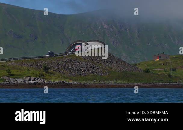 Curving dramatically over rocky norwegian coastline, storseisundet ...