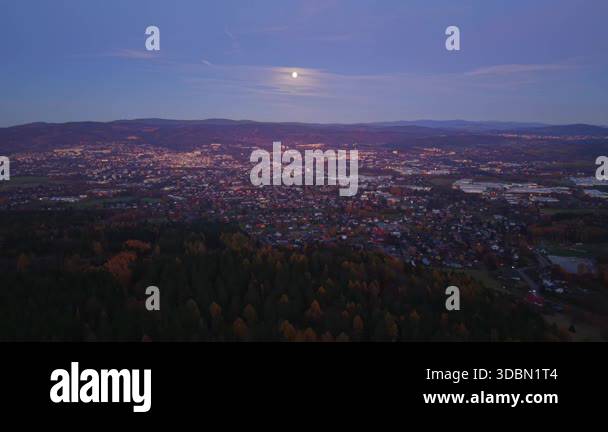 moonlit cityscape and evening lights from high vantage, sprawling ...