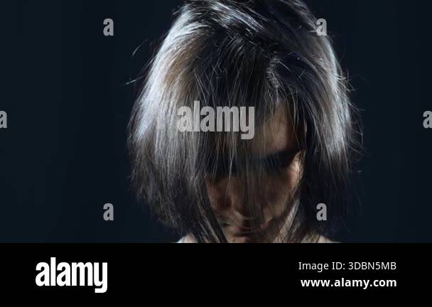 Teenager staring downward reflecting depression, anxiety, social ...