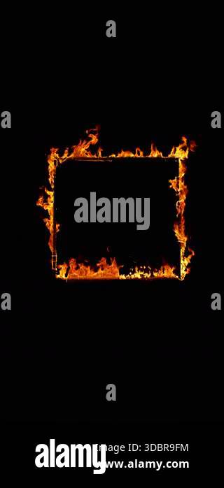 Shot of a burning wooden frame isolated on a black background. Intense ...