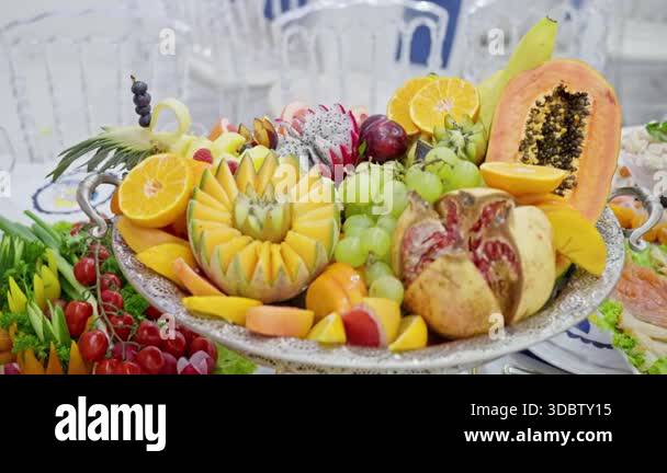 Vibrant Fruit Platter With Papaya, Grapes And Pomegranate, Carved Melon ...